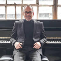 Biografia de Brian Simpson